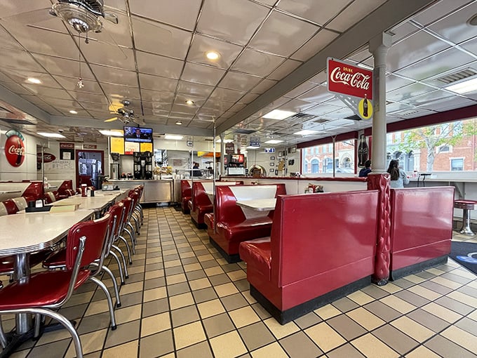 Red vinyl booths and chrome stools aren't retro by design—they're authentic survivors from an era when diners were America's living rooms.