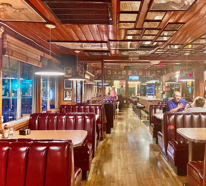 Step inside and you're transported to diner heaven – red vinyl booths, wood-paneled walls, and that unmistakable feeling that breakfast is about to get serious.