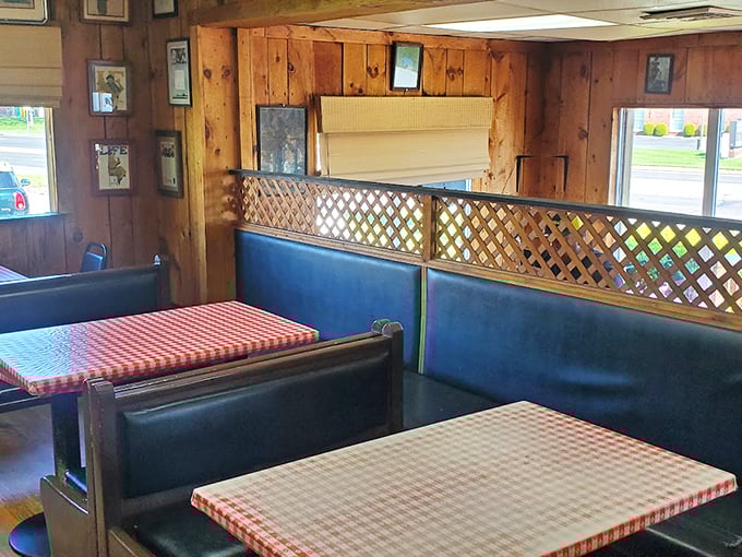 Classic deli ambiance with wood-paneled walls and checkered tablecloths – like stepping into a time machine where smartphones don't exist and conversation still reigns.