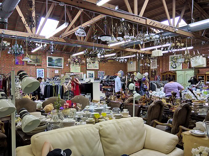Organized chaos at its finest – where chandeliers create a canopy of sparkle above an Aladdin's cave of potential purchases.