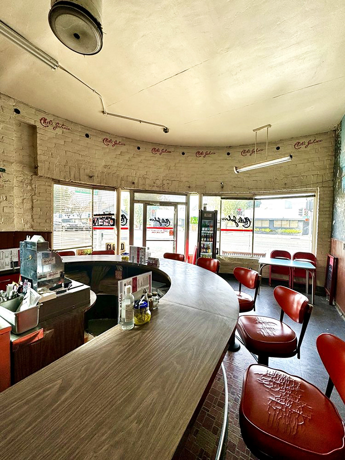 Step inside and the horseshoe counter beckons with its red vinyl stools—a diner setup that hasn't needed changing since before Instagram was even a concept.