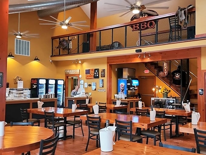 High ceilings, warm wood tones, and that balcony emblazoned with "BBQ"—this isn't just a restaurant, it's a cathedral of carnivorous delights.