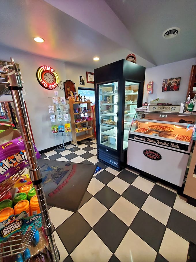 Classic black-and-white checkered floors and a "Time to Eat" neon sign—this place understands the universal language of comfort food nostalgia.