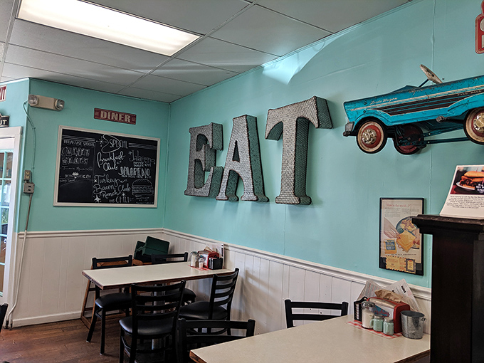 Those metal "EAT" letters aren't just decor—they're more like friendly instructions you'll be all too happy to follow once you see what's coming from the kitchen.