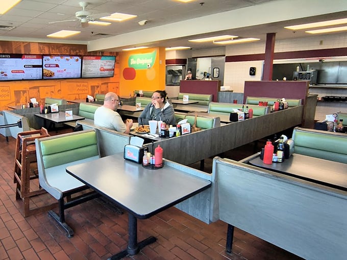 Those mint green booths have witnessed more chicken sandwich epiphanies than a Southern Baptist revival meeting.