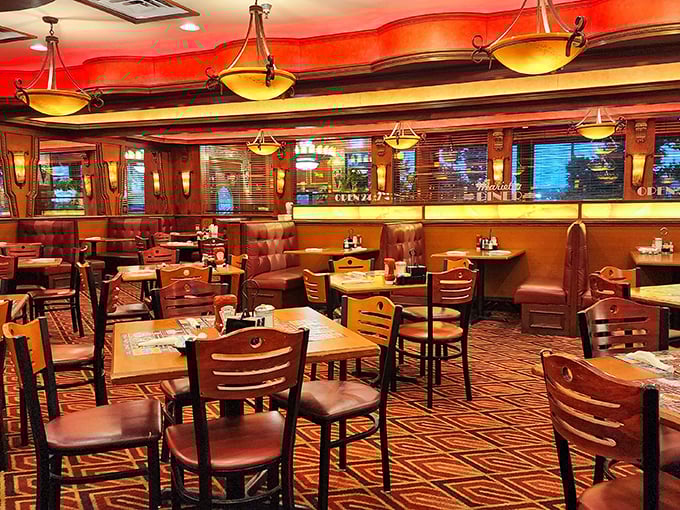 Warm wood paneling, plush booths, and amber lighting create the perfect backdrop for life's important questions—like "Should I order dessert?" (The answer is always yes.)
