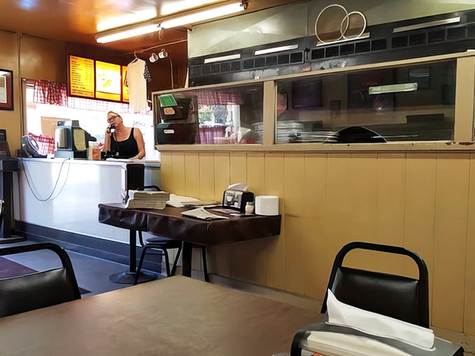 Inside, time stands still. The no-frills counter and simple seating speak volumes: here, it's all about the food, not the furniture.