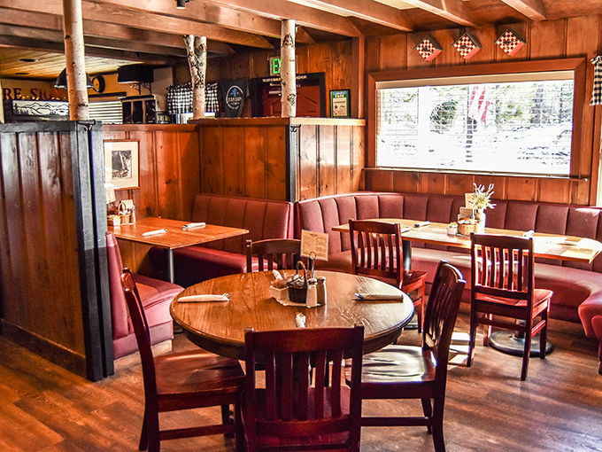 Warm wood paneling and burgundy booths create that perfect mountain ambiance—like dining in a friend's cabin, if your friend happened to be a breakfast genius.