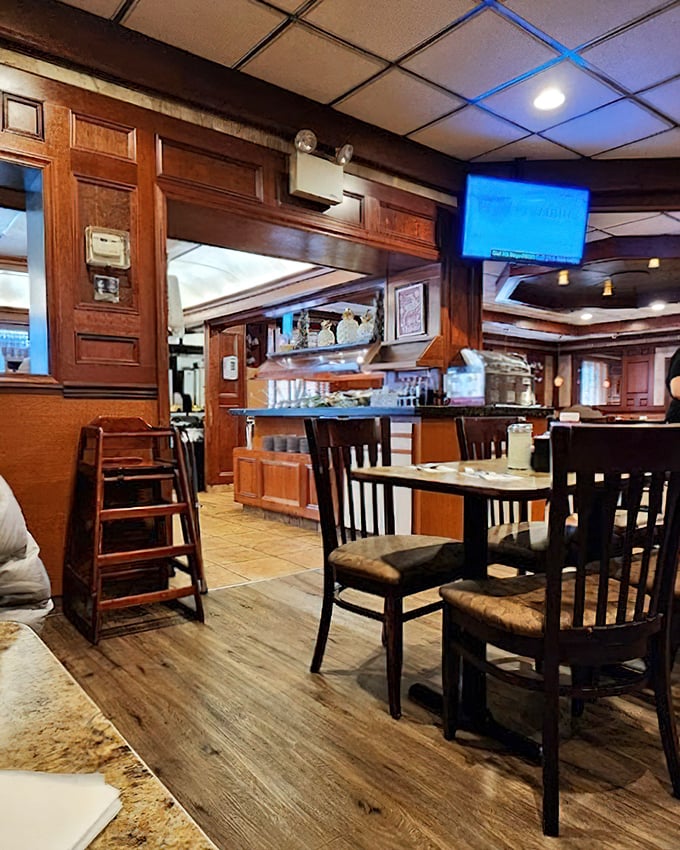 Rich wood paneling and classic diner seating create that "everybody knows your name" vibe – minus Norm and Cliff, but with all the comfort.