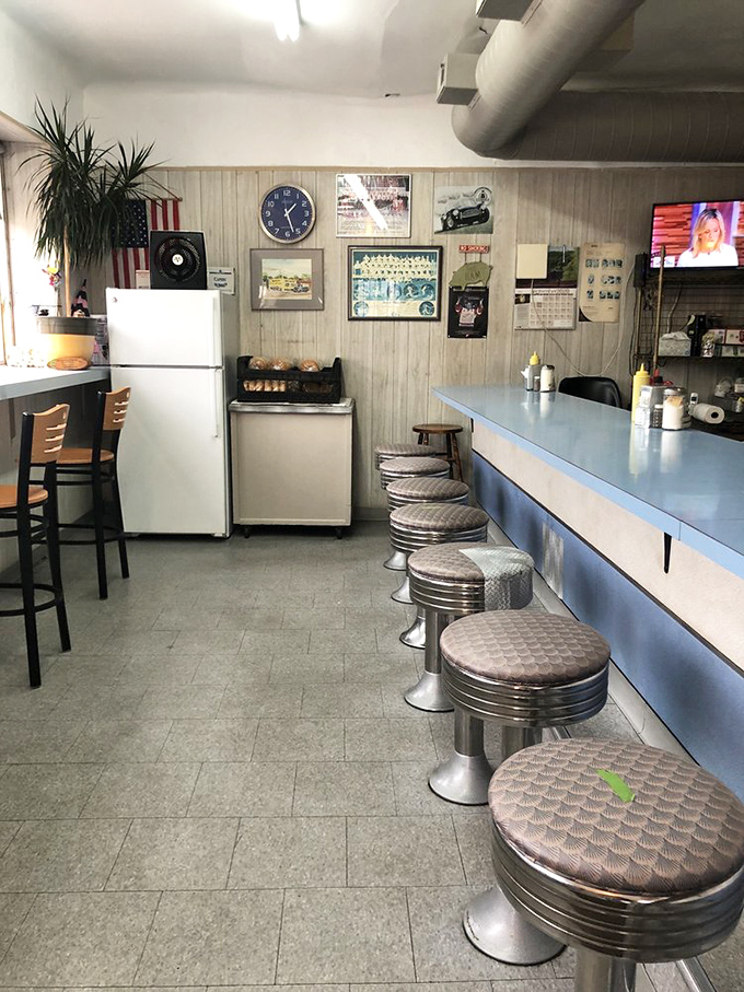 Classic chrome stools line the blue counter where countless Detroiters have perched for their ham fix. This isn't retro design—it's simply never changed.