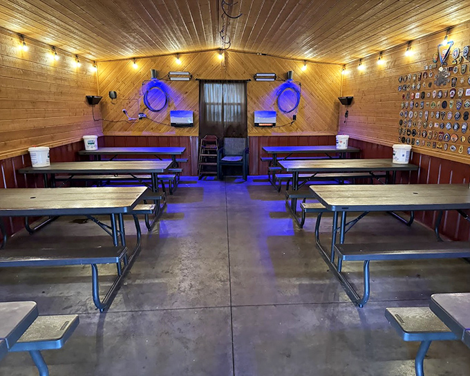 Inside, the wood-paneled dining area feels like a secret clubhouse for barbecue enthusiasts, with picnic tables ready for the serious business of feasting.