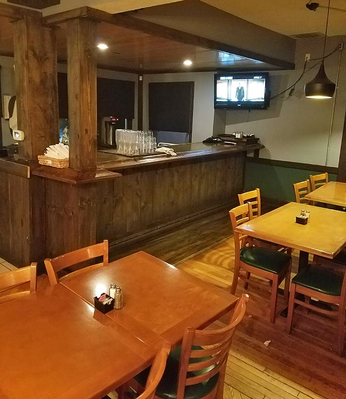 Rustic wooden beams and warm lighting create that "Cheers" vibe—where everybody might not know your name yet, but they'll remember your order.