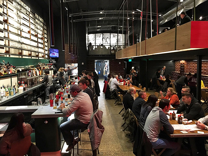 Industrial-chic meets meat paradise inside Mabel's. The communal tables aren't just furniture—they're launching pads for carnivorous adventures.