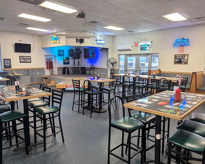 Inside Jeff's, high-top tables and corrugated metal wainscoting create that perfect balance of casual comfort and small-town charm that makes regulars out of first-timers.