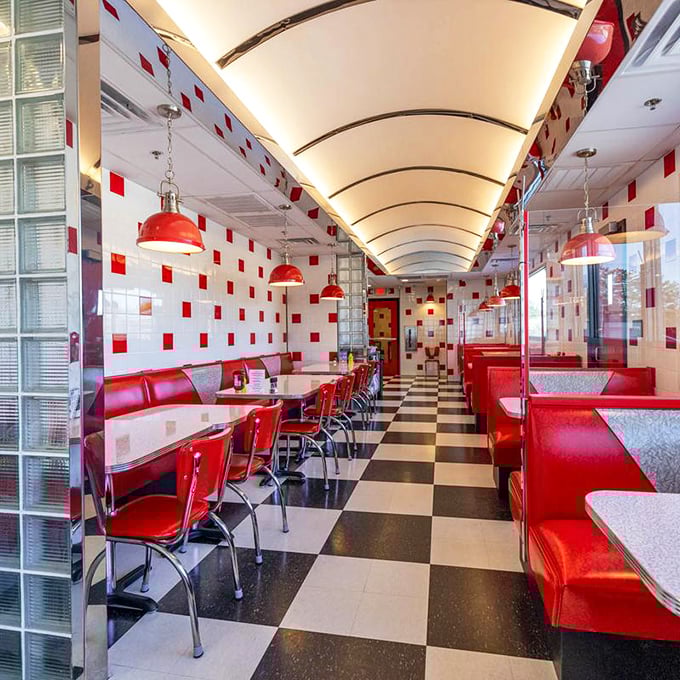 Red vinyl booths, checkerboard floors, and that curved ceiling—walking into Goober's feels like stepping into a Norman Rockwell painting that serves coffee.