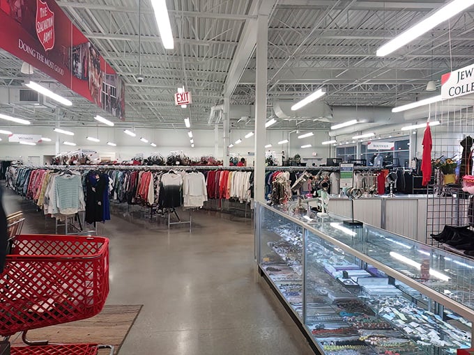 Organized chaos at its finest—racks upon racks of potential wardrobe transformations await. The thrill isn't knowing what you'll find, but knowing something wonderful is hiding here.