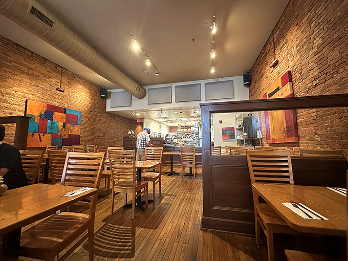 Exposed brick and wooden floors create that perfect "where everybody knows your name" vibe, minus Norm hogging the best table.