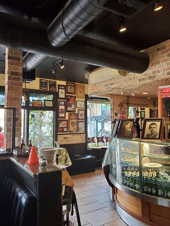 Step inside and breathe deep—exposed brick, family photos, and that curved gelato case tell you this isn't just dinner, it's a culinary homecoming.