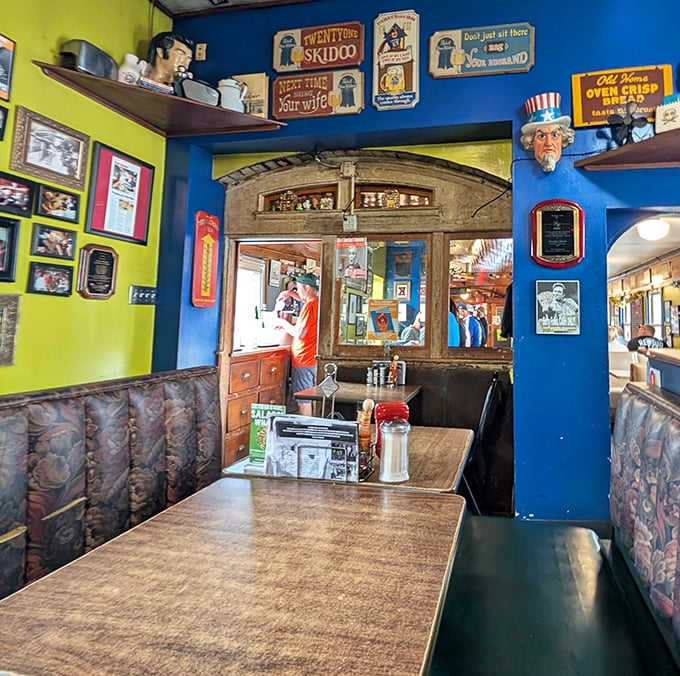Step inside and you're transported to a bygone era where booths tell stories, walls showcase history, and calories are just happy little accidents.