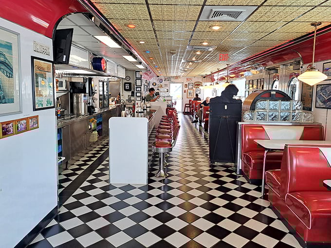 Step inside and time stands still. The checkered floor, red vinyl booths, and counter seating create the perfect backdrop for breakfast dreams and lunchtime conversations.