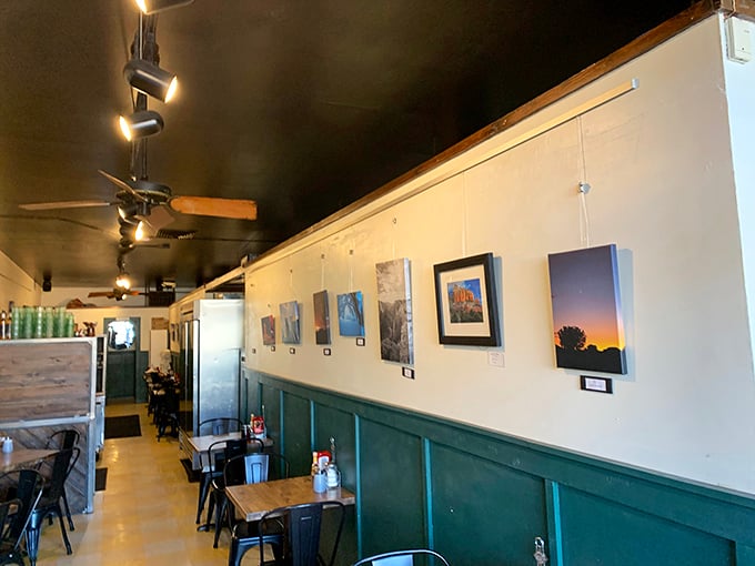 Local artwork adorns the walls, turning a simple meal into a cultural experience. It's like dining in a cozy gallery where the food is the main masterpiece.
