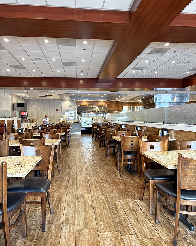 Warm wooden tones and comfortable seating create an inviting atmosphere where the only difficult decision is how many trips to make to the buffet.