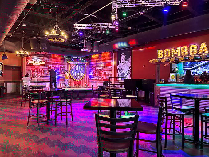 Step inside and you're transported to honky-tonk heaven – neon lights, wooden tables, and enough country atmosphere to make Willie Nelson feel right at home.