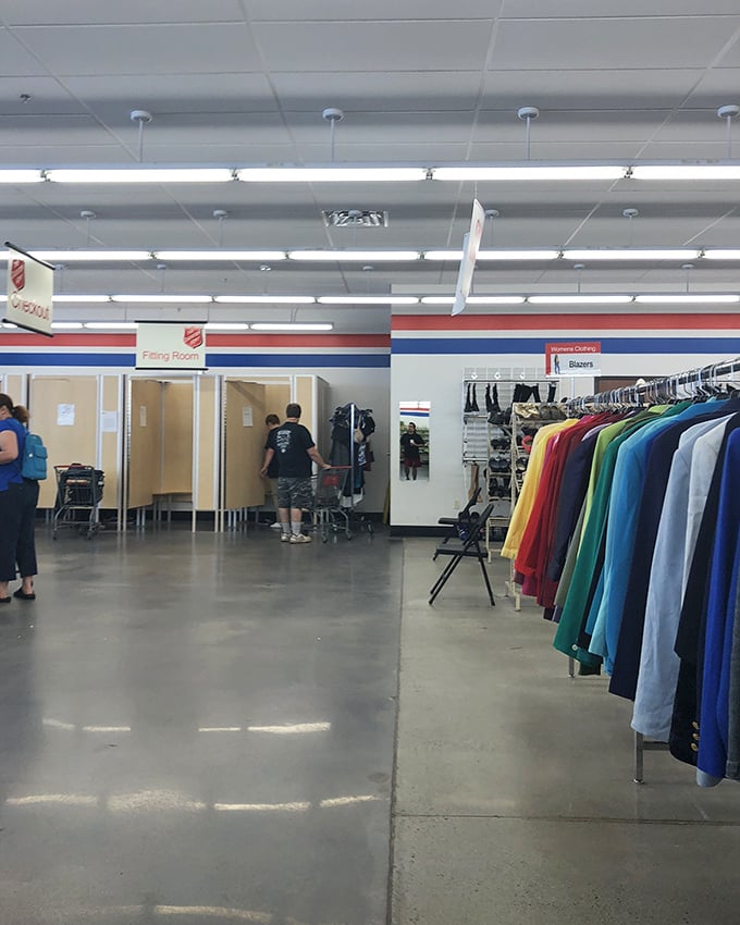 The fitting room area beckons with possibilities. Here's where fashion dreams are reborn and wallets breathe sighs of relief.