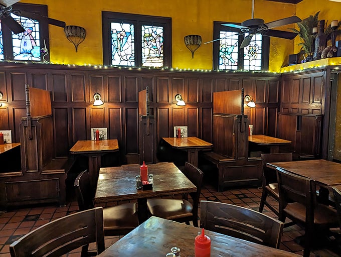 Those stained glass windows aren't just for churches. At Ringside, they cast a warm glow that makes every burger look like it deserves its own Renaissance painting.
