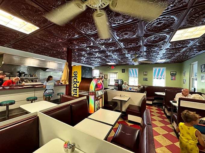 Step inside and time slows down under that gorgeous tin ceiling. The vintage jukebox stands ready – because every perfect breakfast deserves its own soundtrack.