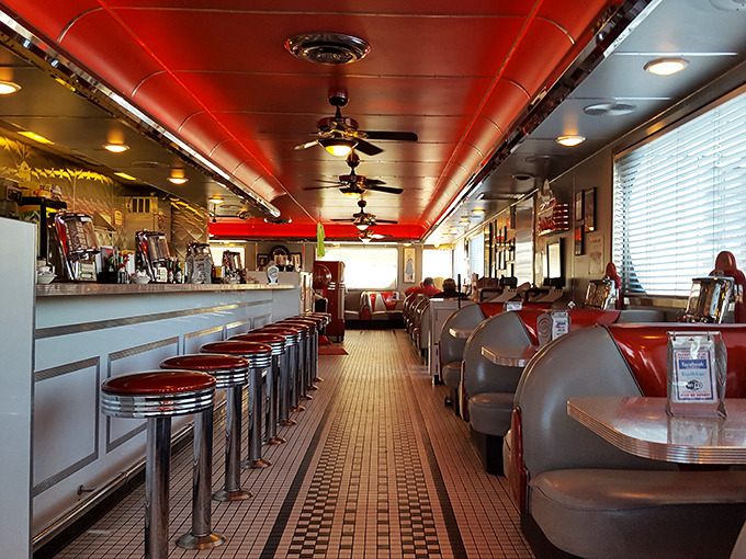Step inside and the red ceiling, chrome fixtures, and vinyl booths transport you to an era when Elvis was king and calories weren't counted.