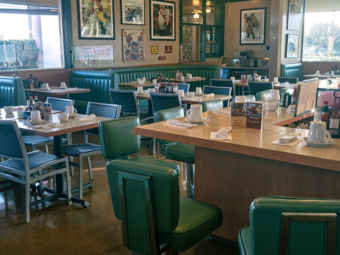 Those teal vinyl booths aren't just seating—they're time machines to when conversation flowed as freely as the coffee.