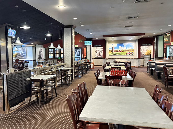 Inside, the spacious dining room balances rustic charm with modern comfort—the perfect backdrop for the food theater about to unfold.