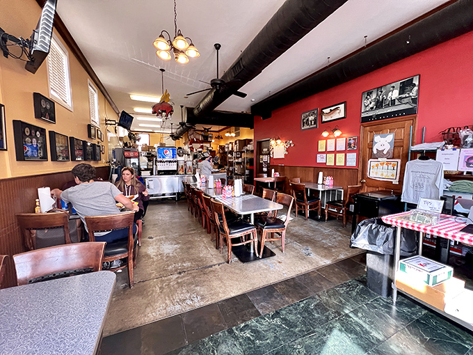Inside, red walls and exposed ductwork create the perfect backdrop for BBQ magic. Like a carnivore's chapel where smoke is sacred.