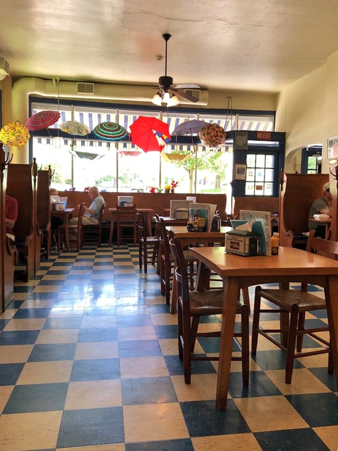 Time travel isn't science fiction at Taggarts—it's what happens when you step onto that checkerboard floor beneath a canopy of colorful umbrellas.