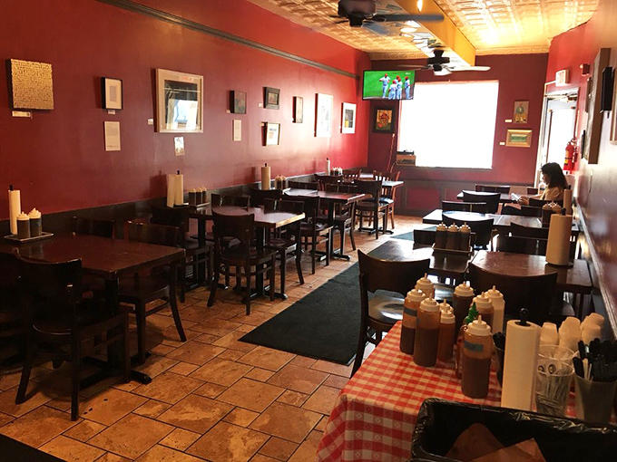 Inside, the cozy red-walled dining room feels like the living room of that friend who always feeds you too well, with sauce bottles standing at attention, ready for duty.