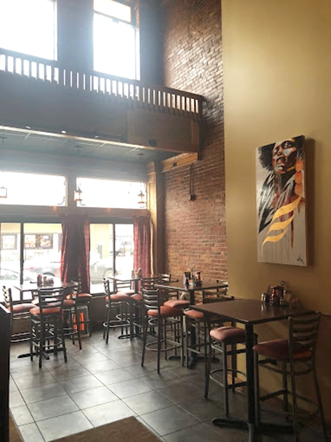 Soaring ceilings, exposed brick, and thoughtful artwork create an atmosphere that's both sophisticated and welcoming—like your coolest friend's loft apartment, but with better food.