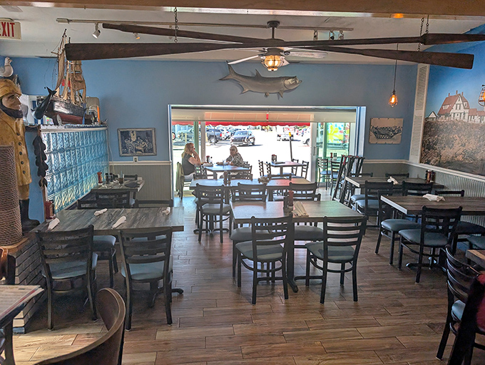 Inside, nautical dreams come to life with blue walls, wooden accents, and maritime decor. It's like dining in a sea captain's living room—if that captain had excellent taste.