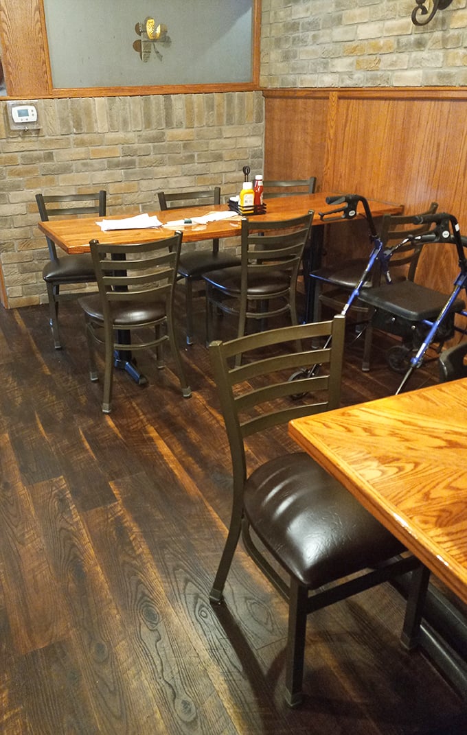 Exposed brick walls and wooden tables create that perfect "everybody knows your name" atmosphere. The walker parked nearby speaks to McGarrey's multi-generational appeal.