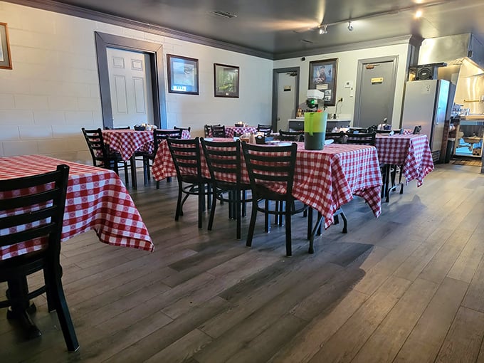 Red and white checkered tablecloths signal you've arrived at steak paradise—no pretension, just the promise of carnivorous bliss.
