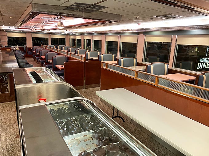 Blue vinyl booths and wood paneling create the quintessential diner experience—where your coffee cup is never empty and everyone might learn your name.