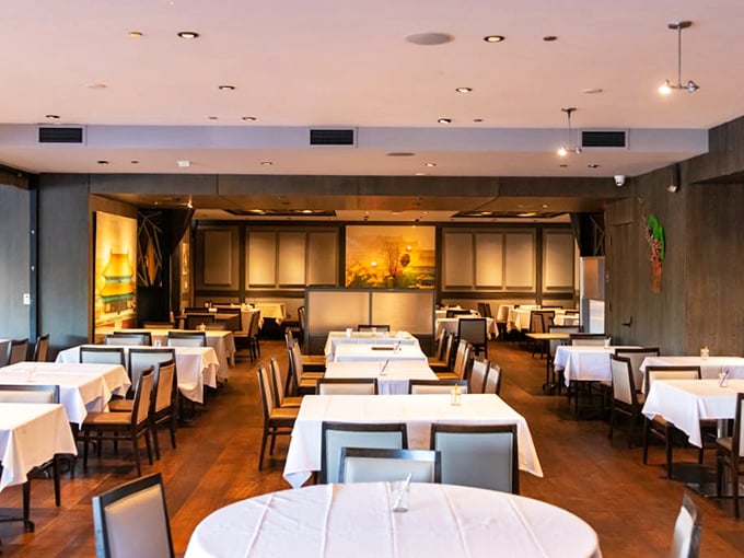 White tablecloths meet warm wooden floors in this elegant yet approachable dining room. It's like the restaurant equivalent of wearing a tuxedo with comfortable shoes.