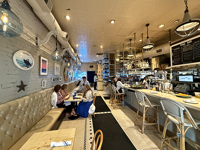 Inside, cream-colored tufted banquettes and nautical lighting create the perfect backdrop for seafood indulgence—like dining in a stylish captain's quarters.