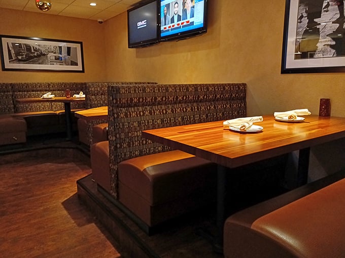 The cozy booth seating at Stancato's isn't just comfortable—it's strategically designed for maximum pasta consumption and minimal judgment.