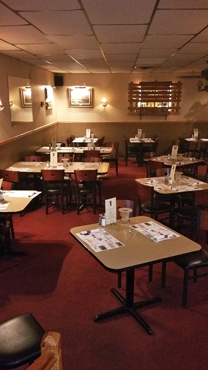 Classic red carpeting, numbered tables, and warm lighting create that unmistakable supper club ambiance. Time slows down the moment you're seated.