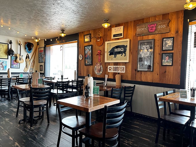 Wood-paneled walls adorned with guitars and pig memorabilia create the perfect backdrop for serious BBQ consumption. This isn't décor—it's a lifestyle statement.