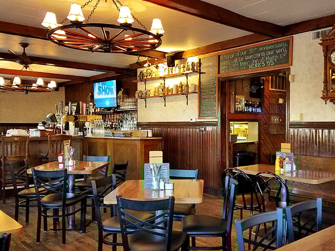 Step inside and time stands still—wagon wheel chandeliers, wooden paneling, and tables that have hosted countless conversations create that "everybody knows your name" vibe.