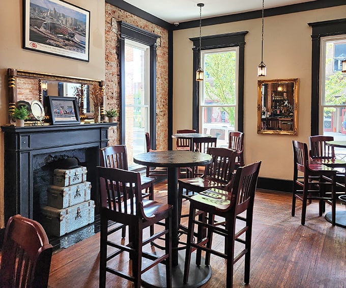 Exposed brick walls tell stories while polished wood floors creak with character. This isn't just dining—it's time travel with better food than they had back then.