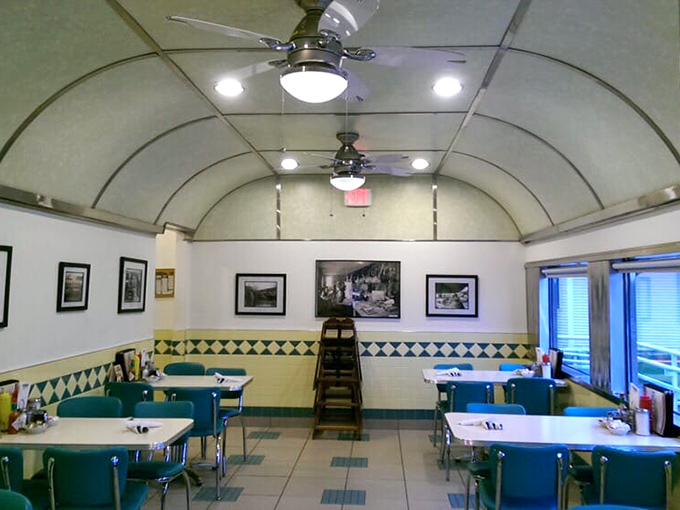 Step inside and you're transported to simpler times—turquoise booths, curved ceiling, and checkered patterns create the perfect backdrop for breakfast bliss.
