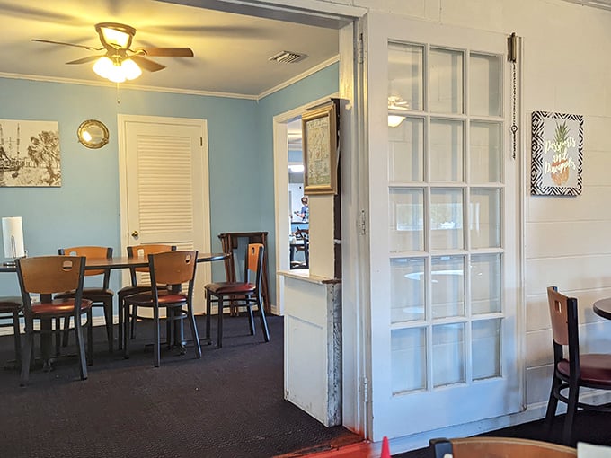 Step inside and you're greeted by soothing blue walls and simple wooden furniture – no pretense, just the promise of honest-to-goodness coastal cooking.